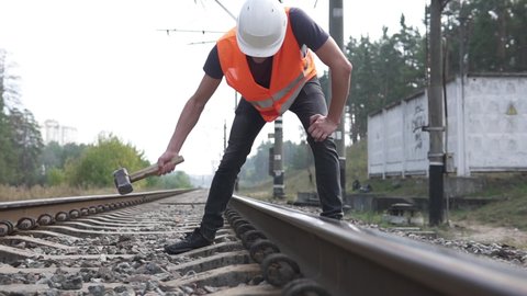 Railway Worker Stands Along Railway Tracks Stock Footage Video (100% ...