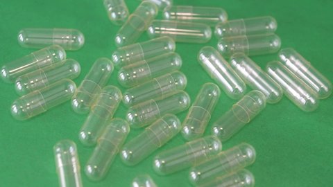 Blank Empty Capsule On Green Background Stock Footage Video (100% ...