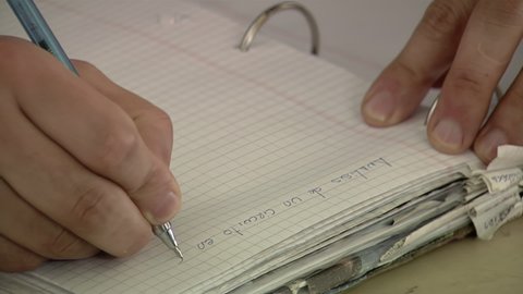 Inmate Writing On His Spiral Notebook Stock Footage Video (100% Royalty ...