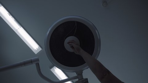 Scrub Nurse Hand Turning On Shadowless Stock Footage Video (100% ...