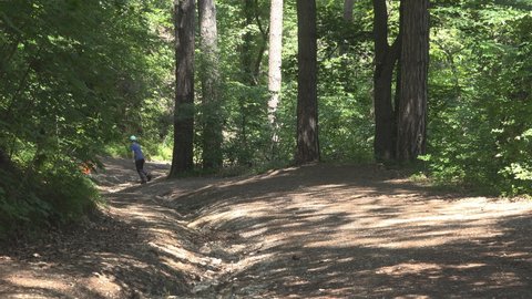 Three Kids Running Down Mountain Path Stock Footage Video (100% Royalty ...