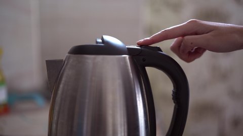 Button Turning On Electric Kettle Boiling Stock Footage Video (100% ...