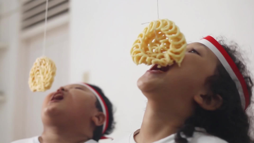 5 Eat crackers in celebration competition Stock Video Footage - 4K and ...