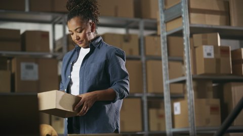 Inventory Manager Preparing Small Cardboard Parcel Stock Footage Video ...