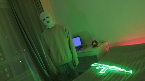 Gangster White Mask Holds Neon Machine Stock Footage Video (100% ...