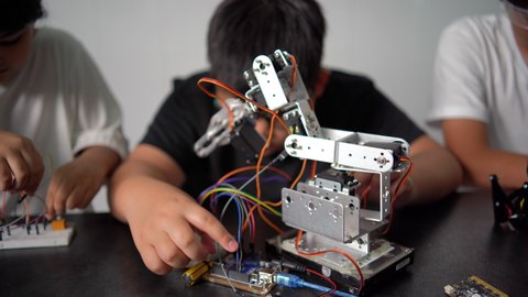 Asian Boy Working On Technology Experiment Stock Footage Video (100% ...