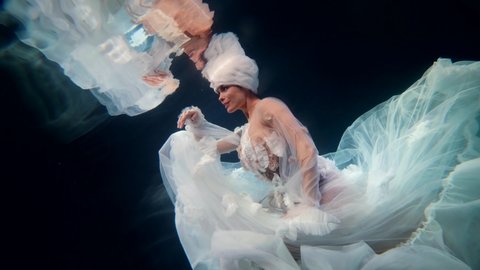 Stunning Underwater Fairy Swimming Under Surface Stock Footage Video ...