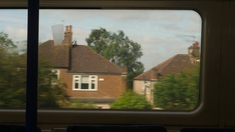 View Houses Trees Train Window Outskirts Stock Footage Video (100% ...