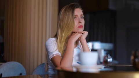 Young Woman Sitting Restaurant Alone Tapping Stock Footage Video (100% ...