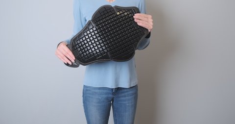 Young Girl Holds Plastic Back Protector Stock Footage Video (100% ...