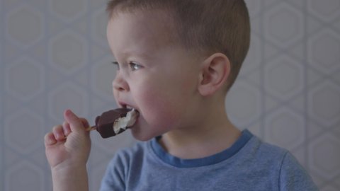 Side View Baby Boy Child Eating Stock Footage Video (100% Royalty-free ...