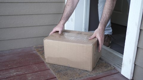 Getting Package Box Left On Doorstep Stock Footage Video (100% Royalty ...