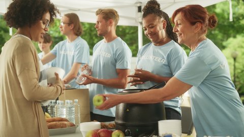 Team Young Volunteers Helping Local Community Stock Footage Video (100% ...