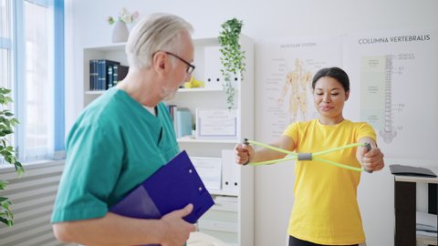 Portrait Smiling Doctor Patient Doing Exercise Stock Footage Video (100 ...