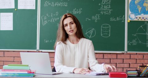 Attractive Female Math Teacher Sitting Desk Stock Footage Video (100% ...