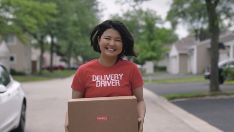 Delivery Driver Deliver Package Slow Motion Stock Footage Video (100% ...