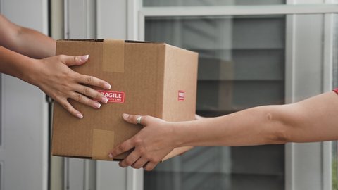 Female Hands Delivery Driver Handing Cardboard Stock Footage Video (100 ...