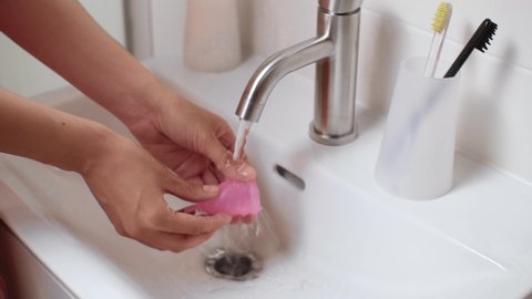 Woman Cleans Menstrual Cup Tap Water Stock Footage Video (100% Royalty ...