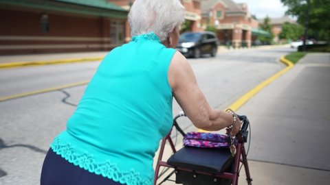 Elderly Senior Woman Pushing Walker Rolling Stock Footage Video (100% ...