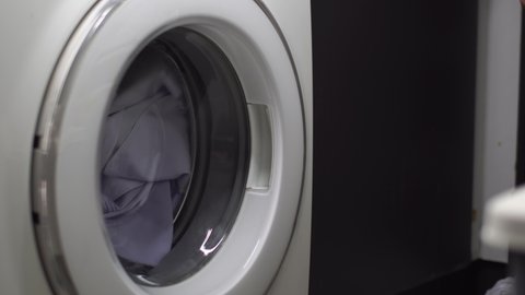 Footage 4k Putting Clothes Inside Washing Stock Footage Video (100% ...