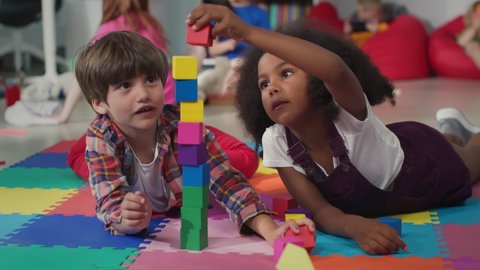 Cute Multiethnic Preschool Kids Playing Colored Stock Footage Video ...