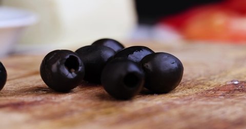 Cut Black Olives Into Pieces While Stock Footage Video (100% Royalty ...