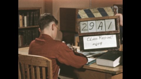 1950s Film Slate Boy Reading Magazine Stock Footage Video (100% Royalty ...