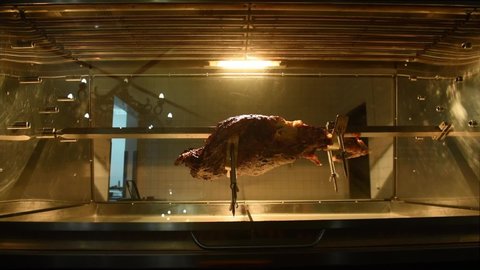 Meat Carcass Roasting On Spit Indoor Stock Footage Video (100% Royalty ...