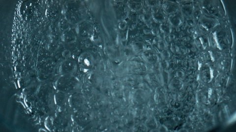 Bubbling Water Pouring Glass Top View Stock Footage Video (100% Royalty ...