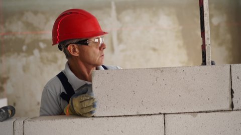 Bricklayer Using Rubber Mallet Hammer Tap Stock Footage Video (100% ...