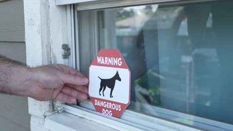 Hands Putting Window Warning Sign Alerting Stock Footage Video (100% ...
