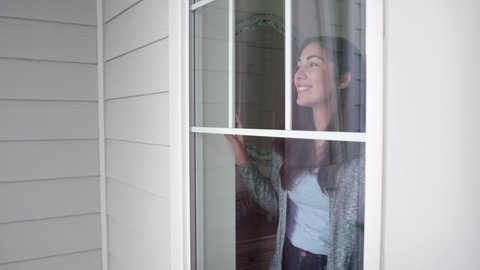 Woman Stands Inside Window Happily Looks Stock Footage Video (100% ...