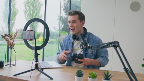 Male Vlogger Live Streaming Product Review Stock Footage Video (100% ...