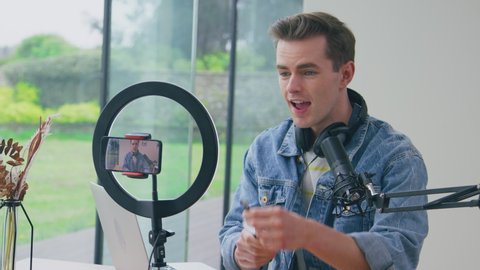 Male Vlogger Live Streaming Product Review Stock Footage Video (100% ...