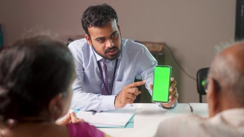 Happy Banker Explaining Online Banking Green Stock Footage Video (100% ...