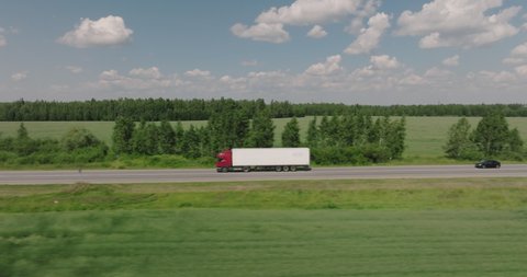 One Semi Truck White Trailer Red Stock Footage Video (100% Royalty-free ...