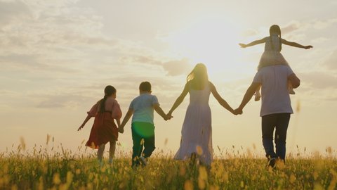 Active Family Children Run Across Grassy Stock Footage Video 100