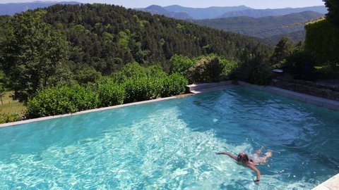 Aerial Fly Over Female Swimming Infinity Stock Footage Video (100% ...