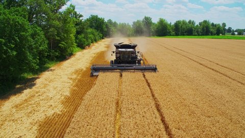 Reverse Tracking Drone Shot Front Combine Stock Footage Video (100% ...