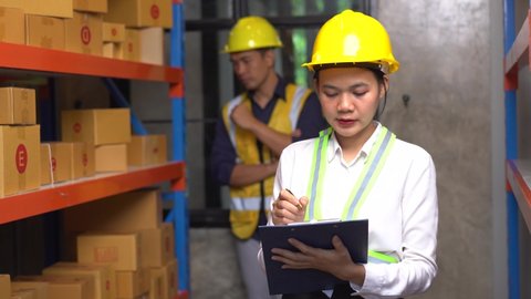 Male Female Inventory Manager Checking Stock Stock Footage Video (100% ...