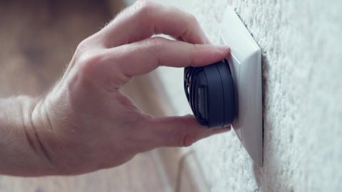 Plugs Mosquito Repellant Into Socket Stock Footage Video (100% Royalty ...