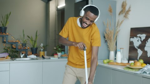 Young Playful Student Mopping Floor Dancing Stock Footage Video (100% ...