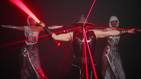 Man Imitating Fight Spinning Red Laser Stock Footage Video (100% ...