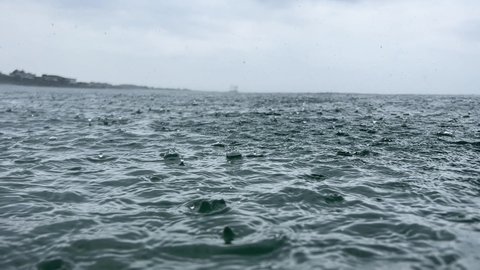 Raindrops Falling On Overflowing Sea Stock Footage Video (100% Royalty ...