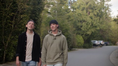 Two Guy Friends Walk Down Beautiful Stock Footage Video (100% Royalty ...