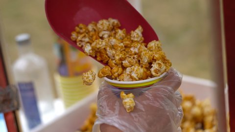 Man Pouring Popcorn Paper Cup Ladle Stock Footage Video (100% Royalty ...