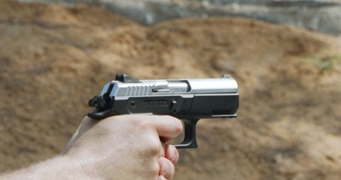 Close Footage Hand Gun Firing Firing Stock Footage Video (100% Royalty ...