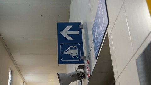 Blue Sign Train Station Pointing Train Stock Footage Video (100% ...