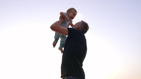 Caring Father Rising His Son Into Stock Footage Video (100% Royalty ...