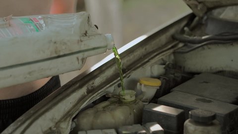 Process Pouring Coolant Into Tank Coolant Stock Footage Video (100% ...